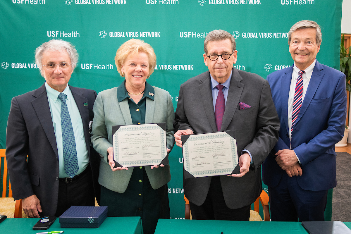 Leaders form stronger ties at USF Health, Global Virus Network signing ...